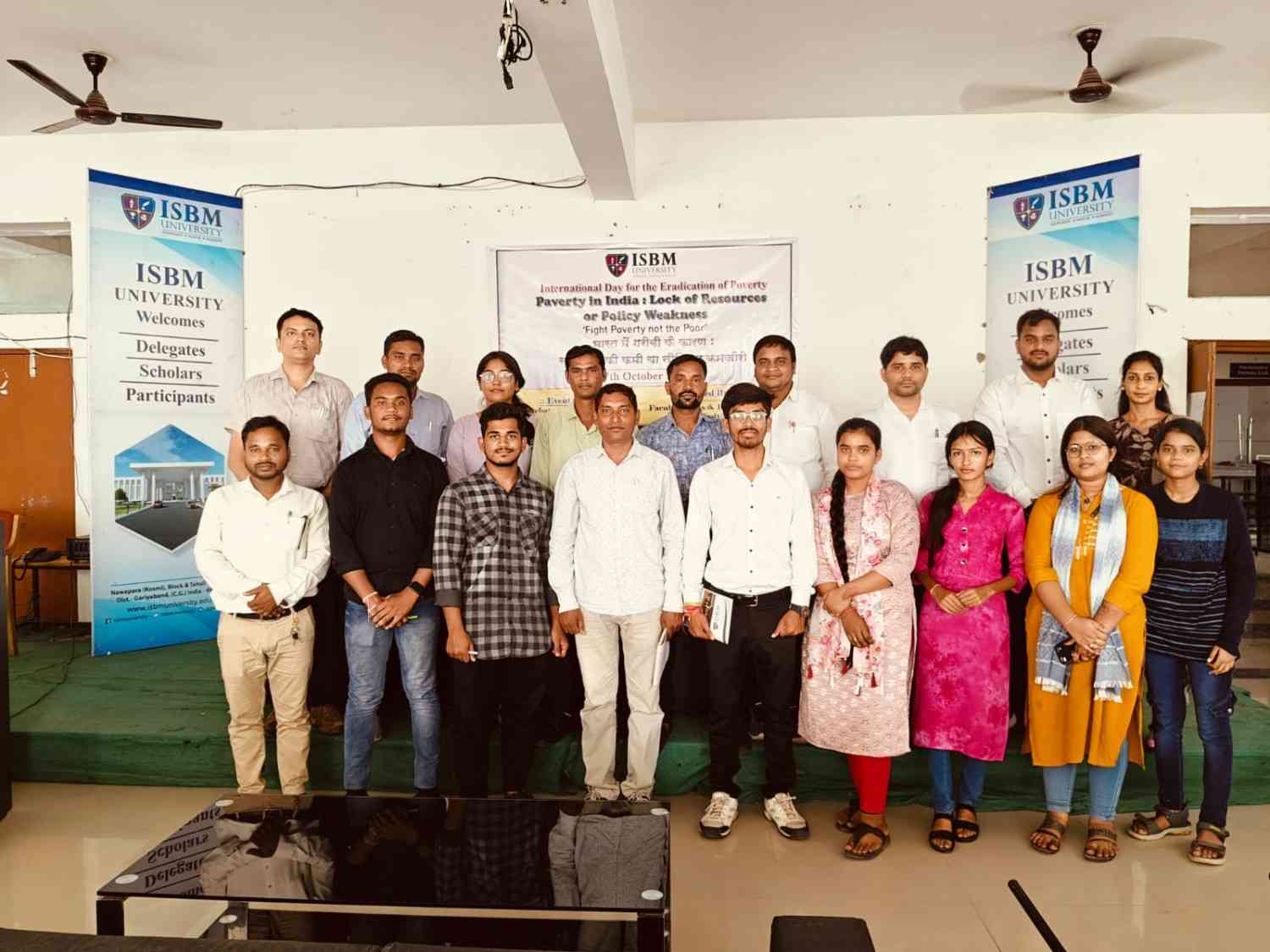 Group photo of students and faculty at an ISBM University event